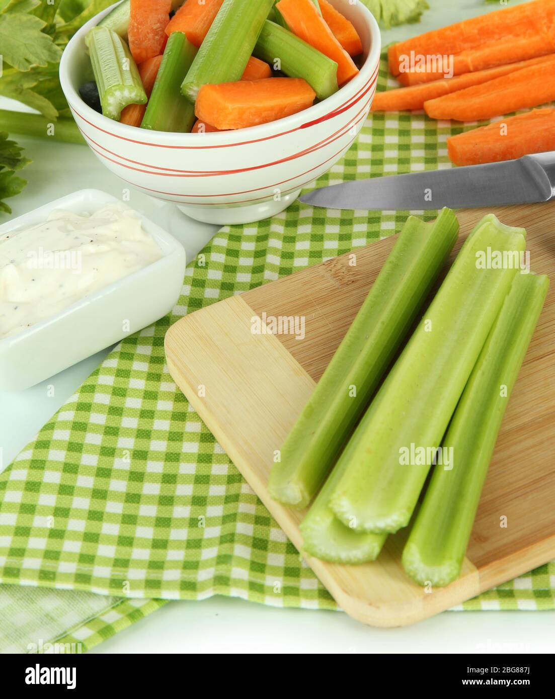 Fresh green celery with vegetables on table close-up Stock Photo - Alamy