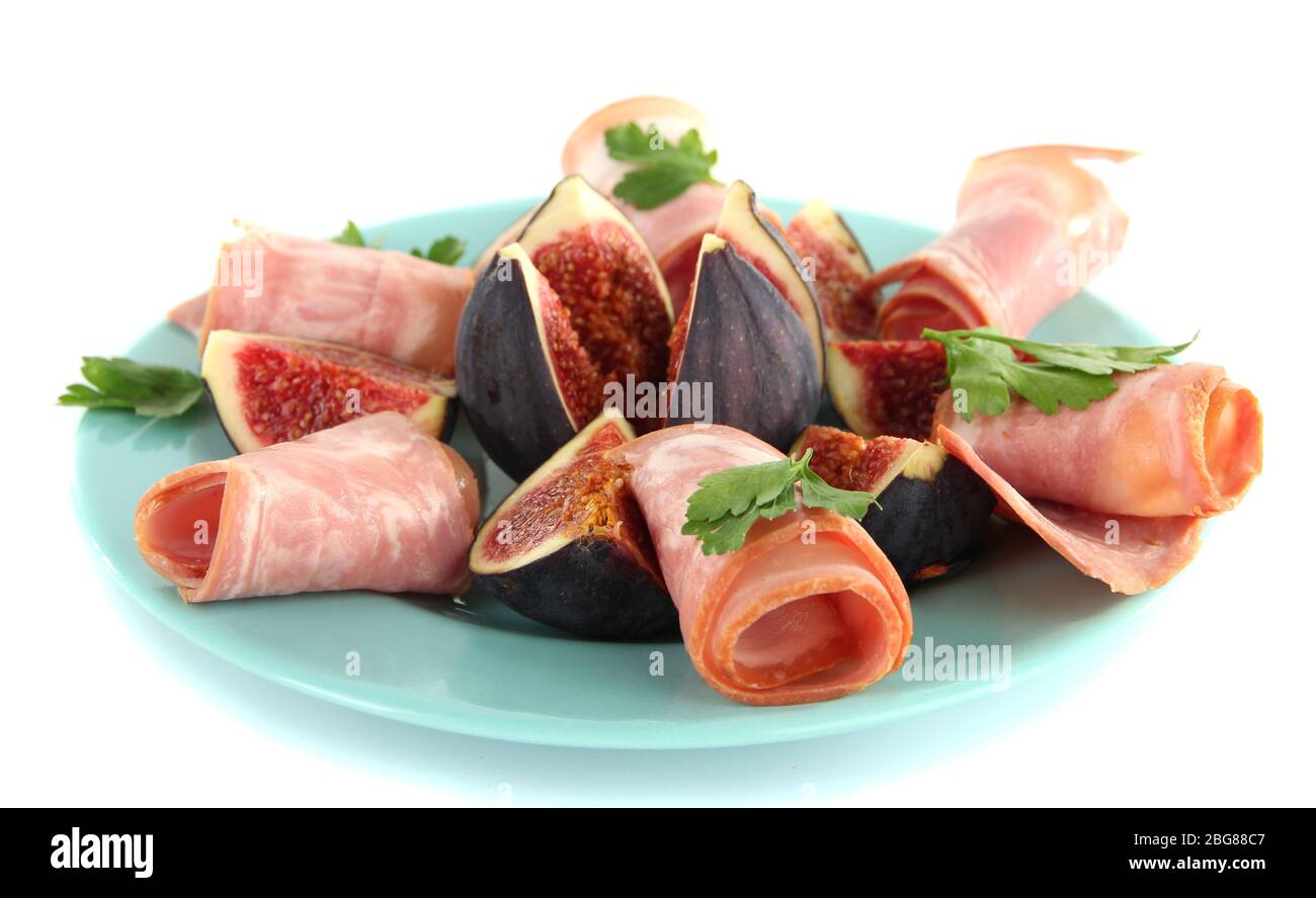Tasty figs with ham, isolated on white Stock Photo - Alamy