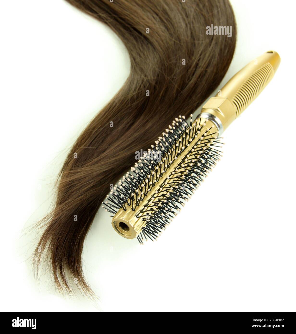 Shiny brown hair with comb isolated on white Stock Photo - Alamy