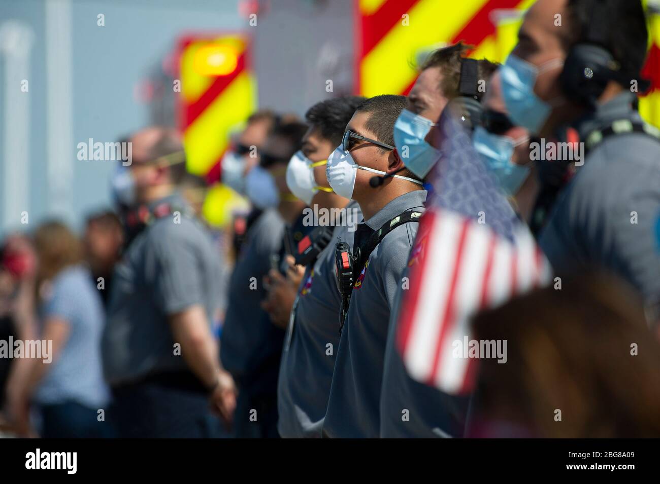 April 20, 2020: Firefighters with the Buda Fire Department stand at ...