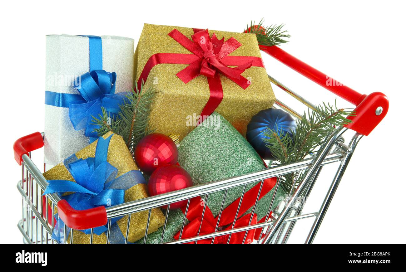 Christmas gifts in shopping trolley, isolated on white Stock Photo - Alamy