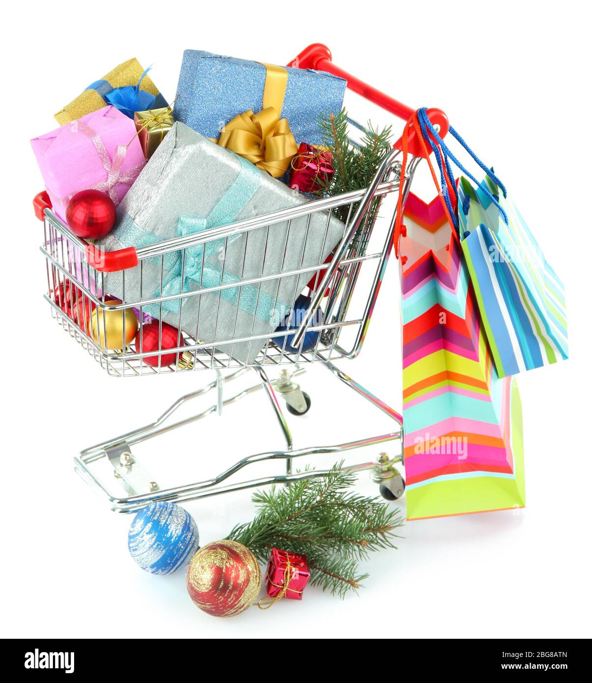 Christmas gifts in shopping trolley, isolated on white Stock Photo - Alamy