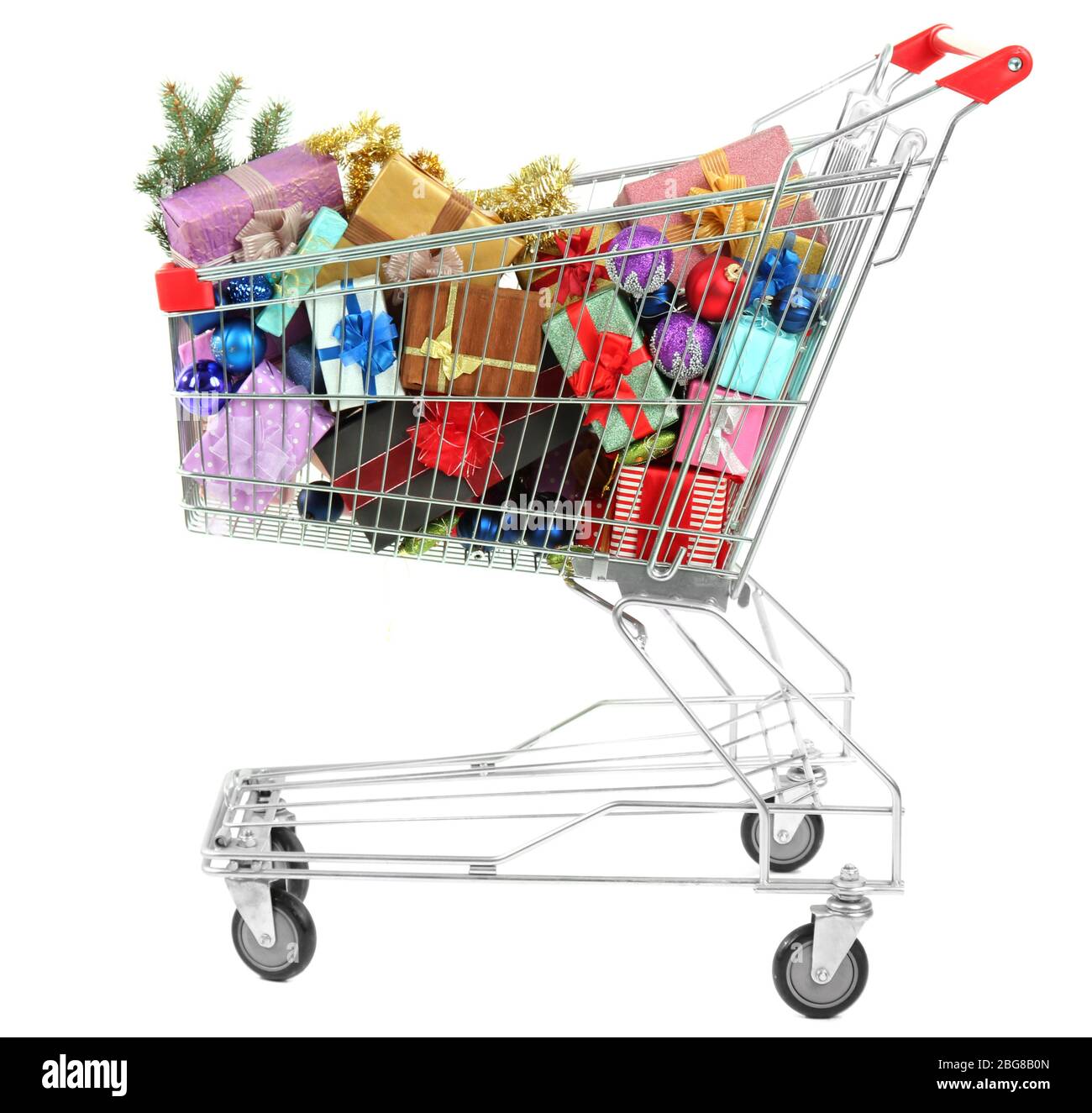 Christmas gifts in shopping trolley, isolated on white Stock Photo - Alamy