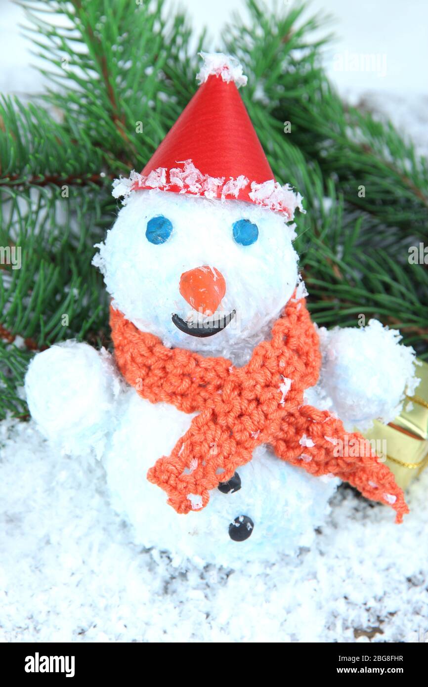 Beautiful snowman on snow Stock Photo - Alamy