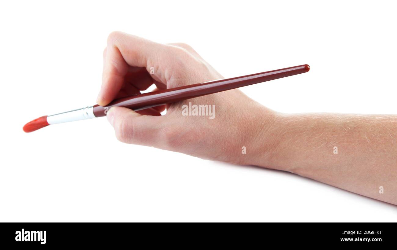 Hand holding brush with red paint isolated on white Stock Photo - Alamy