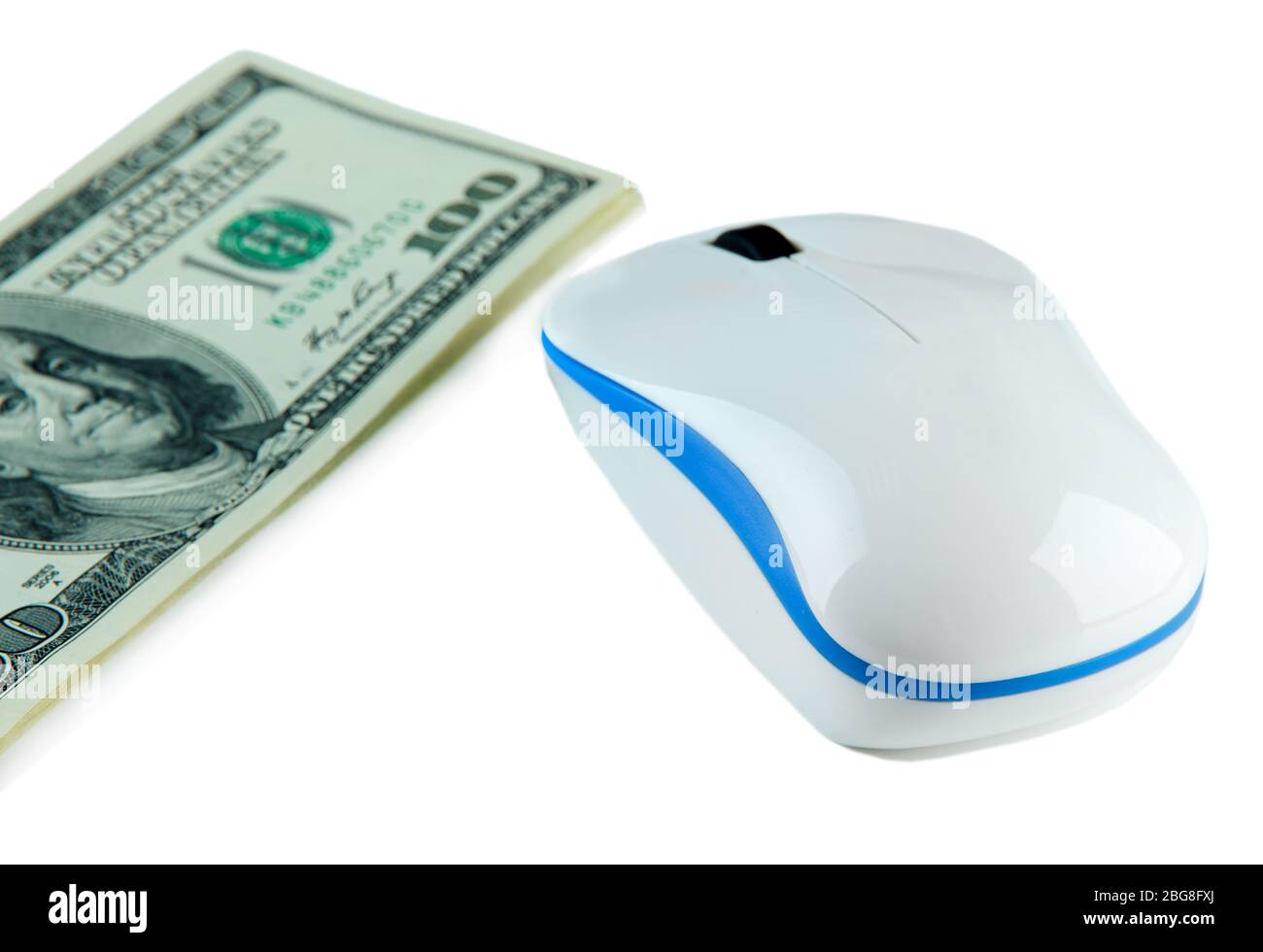 Computer mouse and dollars isolated on white Stock Photo - Alamy