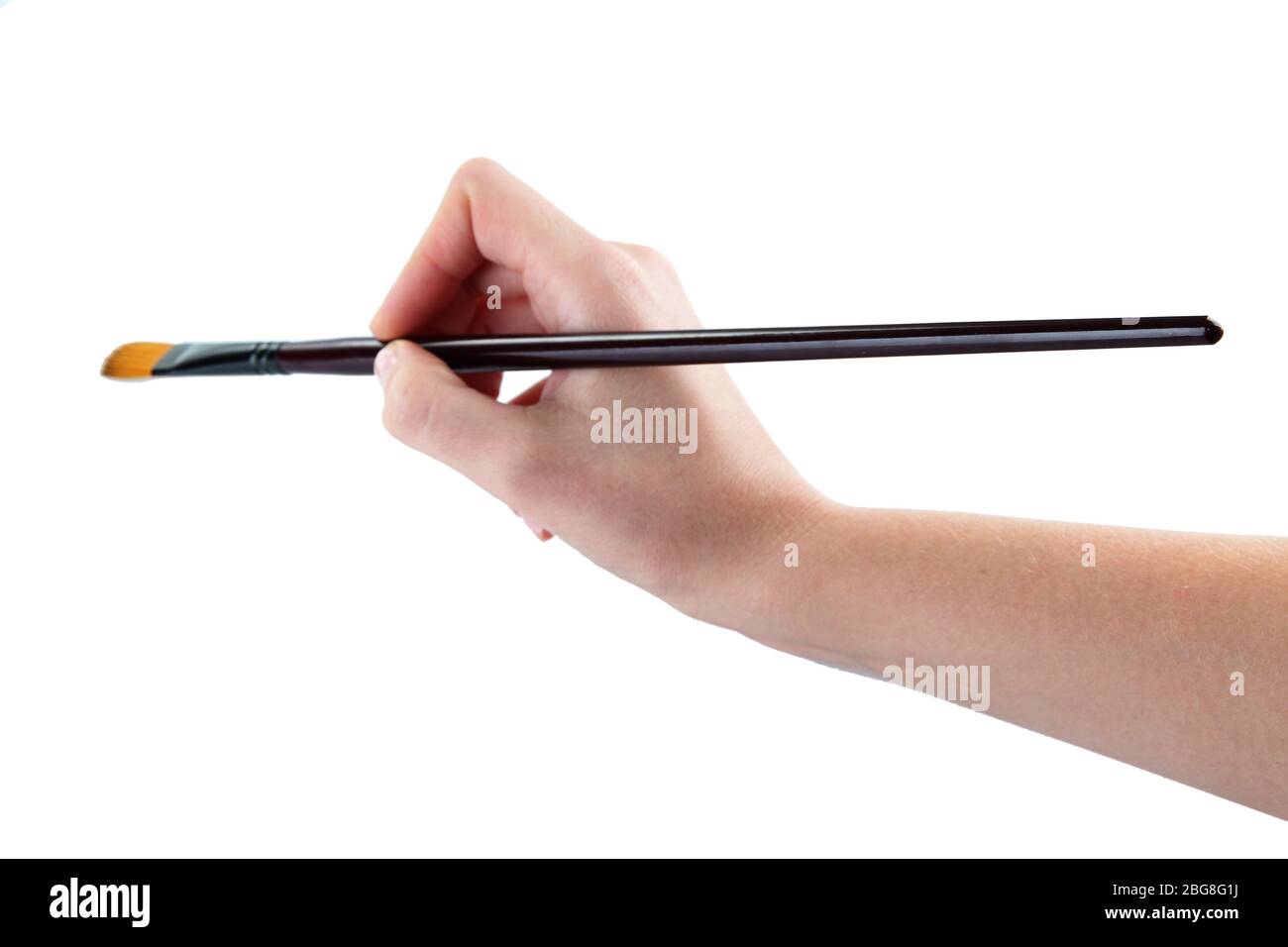 Paint brush in hand isolated on white Stock Photo - Alamy