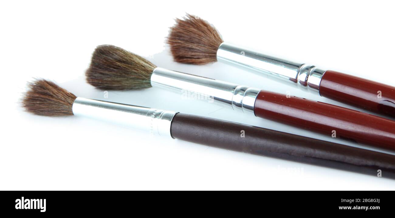 Three paint brushes isolated on white Stock Photo - Alamy