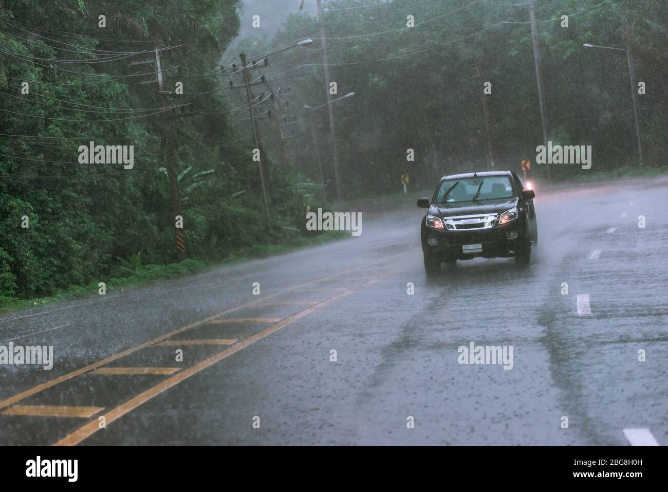 Light rain on road hi-res stock photography and images - Alamy