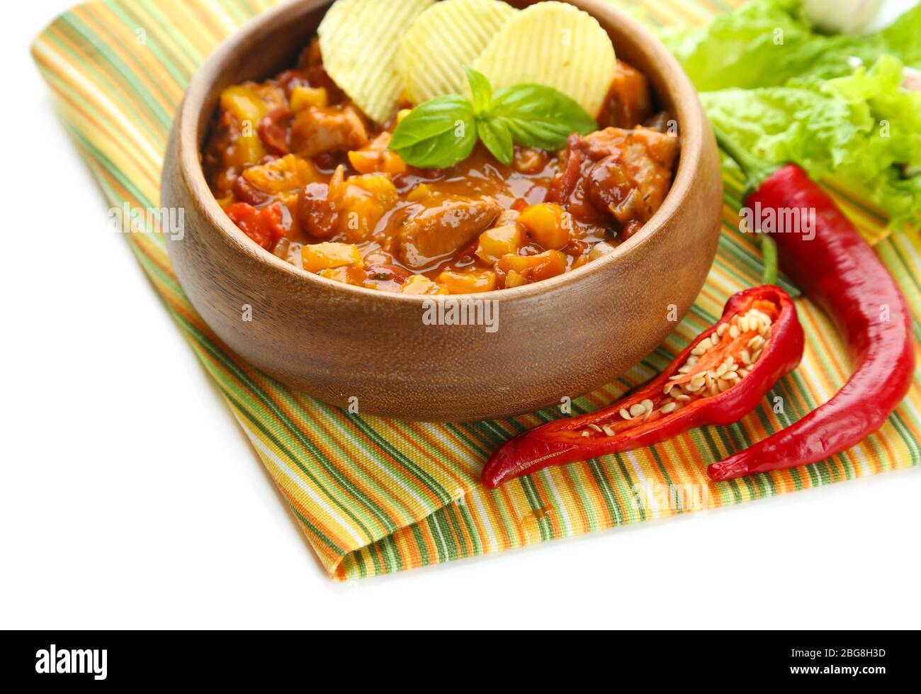 Chili Corn Carne - traditional mexican food, in wooden bowl, on napkin ...