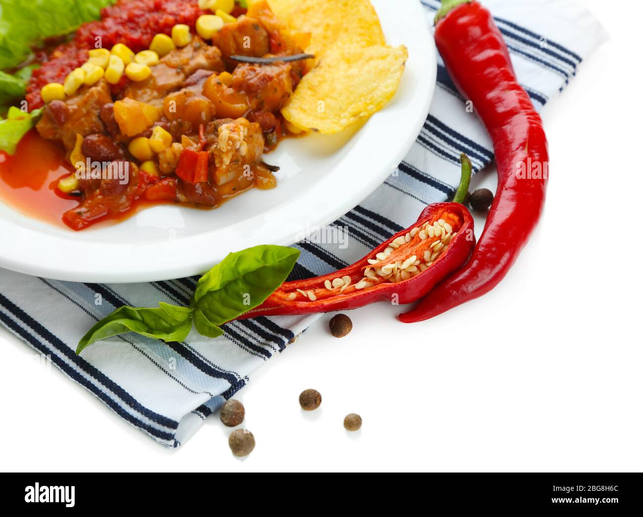 Chili Corn Carne - traditional mexican food, on white plate, on napkin ...