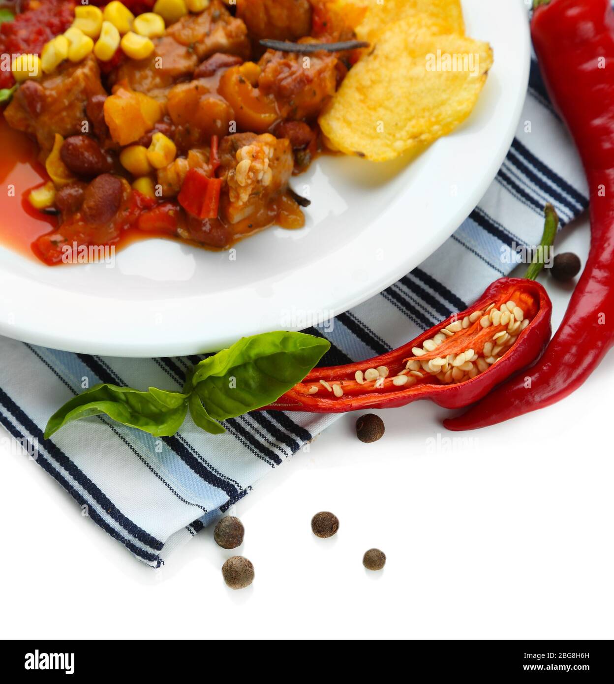 Chili Corn Carne - traditional mexican food, on white plate, on napkin ...