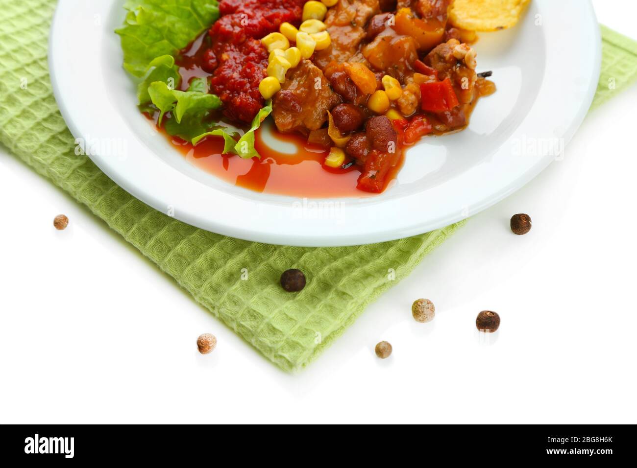Chili Corn Carne - traditional mexican food, on white plate, on napkin ...