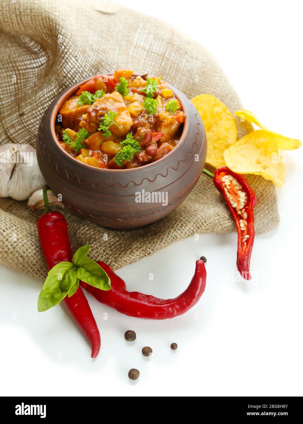 Chili Corn Carne - traditional mexican food, in pot, on sackcloth ...