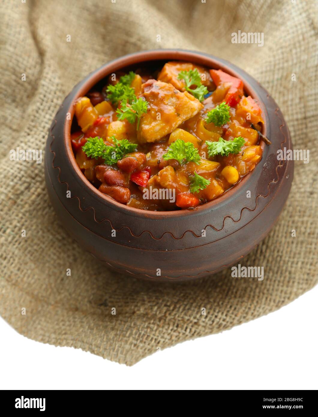 Chili Corn Carne - traditional mexican food, in pot, on sackcloth ...
