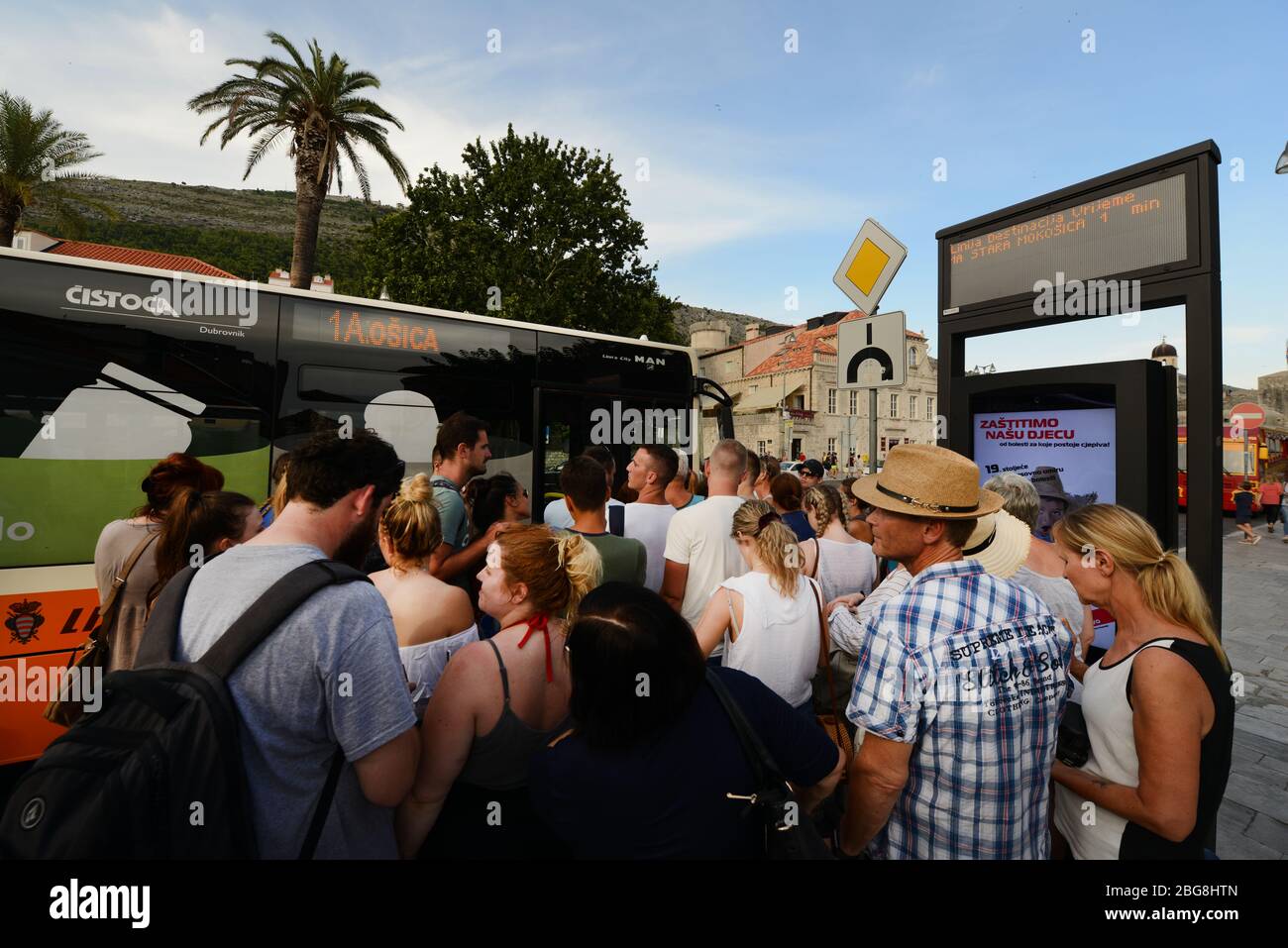 Tourist queuing in line for the public bus in Dubrovnik, Croatia Stock ...
