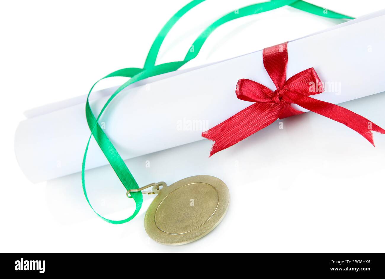 Medal for achievement in education with diploma close up Stock Photo ...