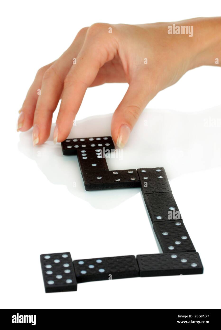 Hand playing domino isolated on white Stock Photo - Alamy