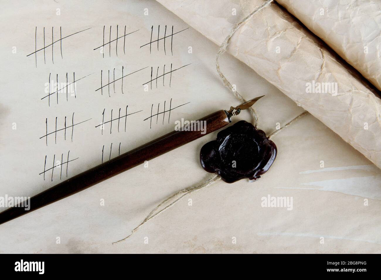 Counting days by drawing sticks on paper close up Stock Photo - Alamy