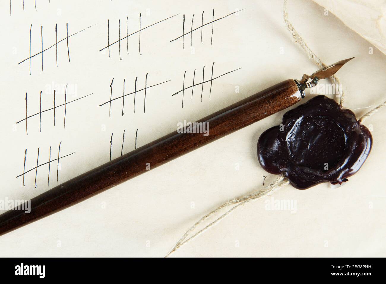 Counting days by drawing sticks on paper close up Stock Photo - Alamy