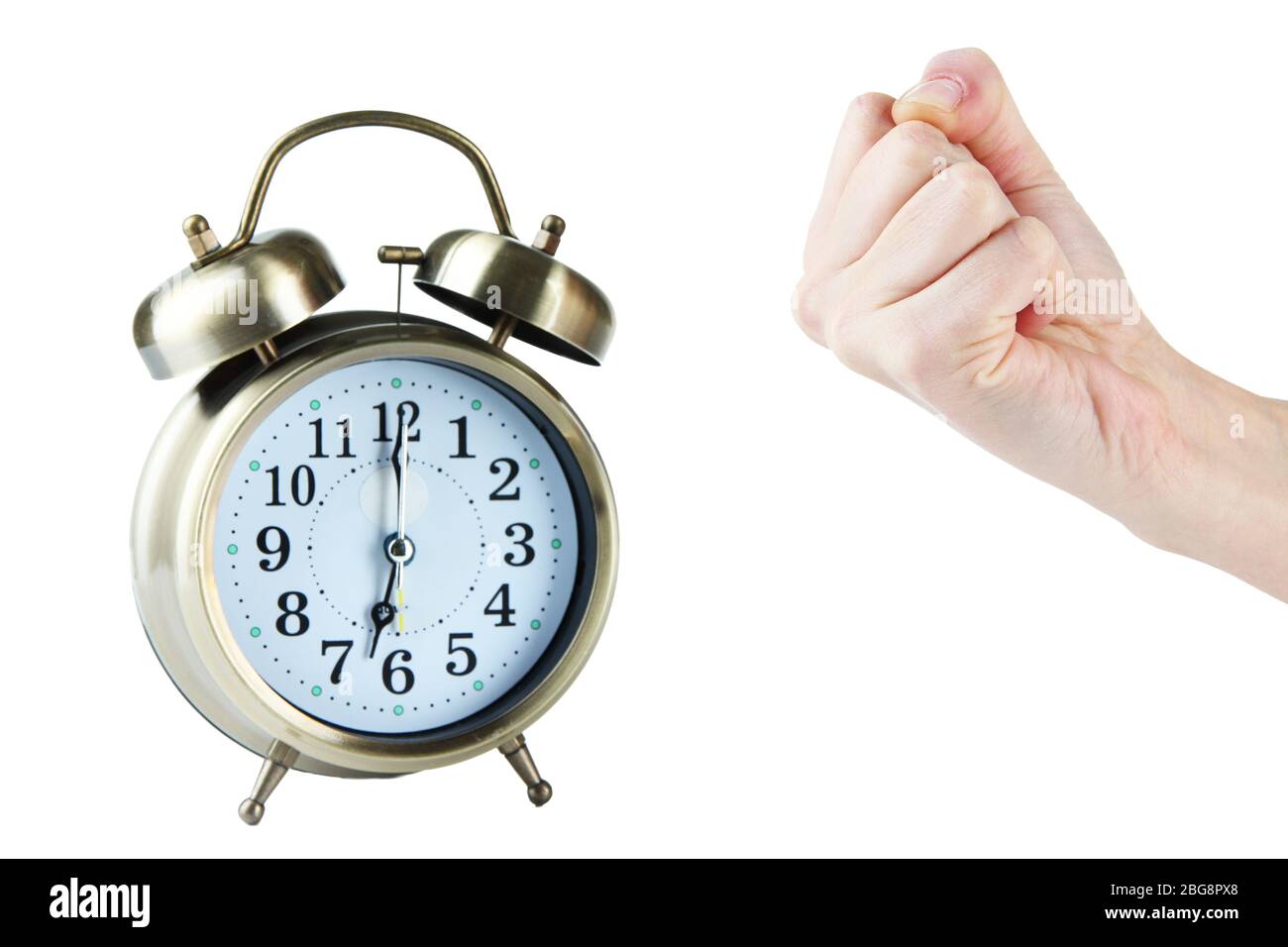 Alarm clock and hand isolated on white Stock Photo - Alamy