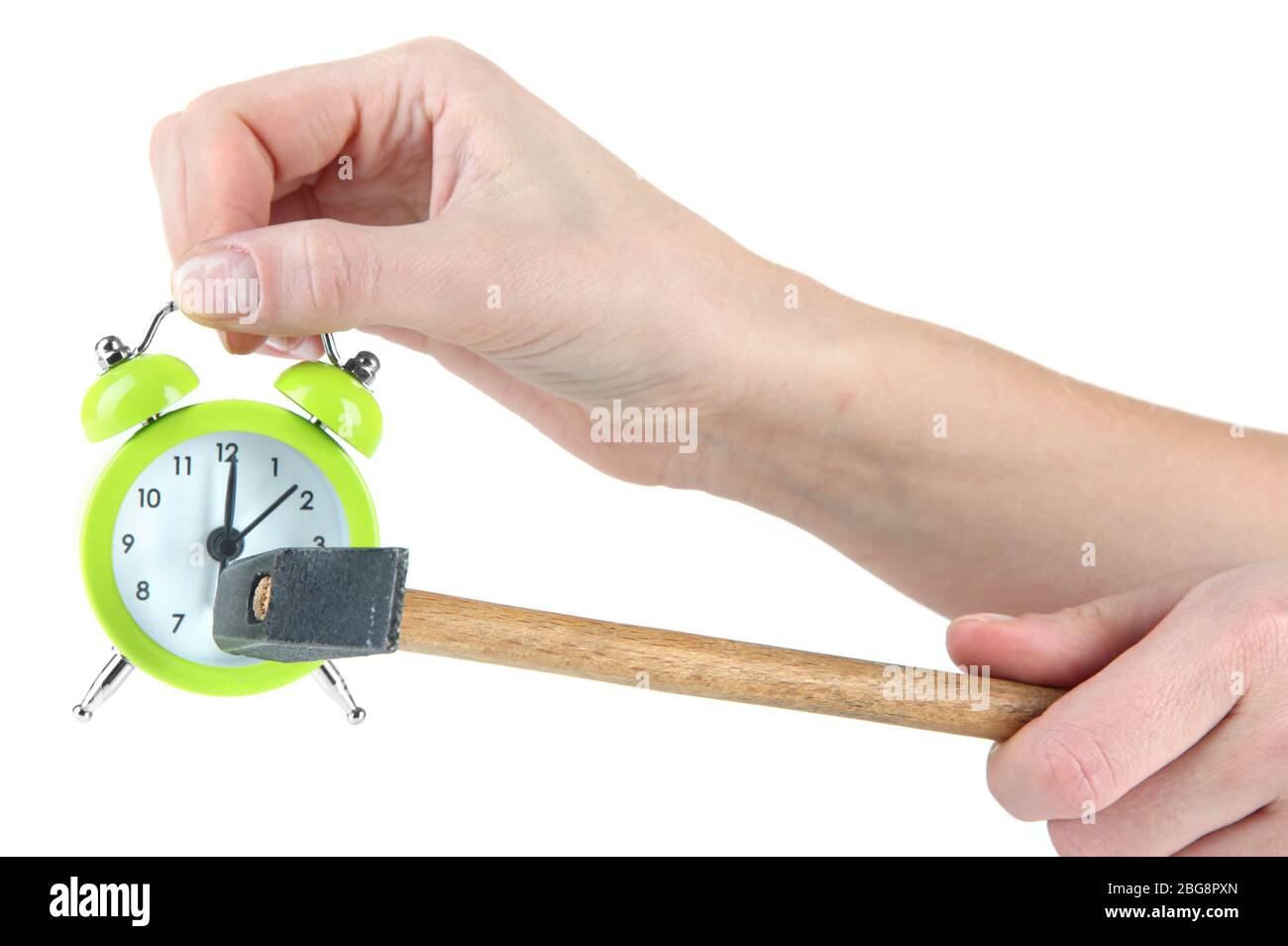 Hammer and alarm clock in hands isolated on white Stock Photo - Alamy