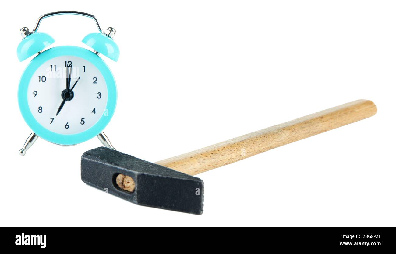 Hammer and alarm clock isolated on white Stock Photo - Alamy
