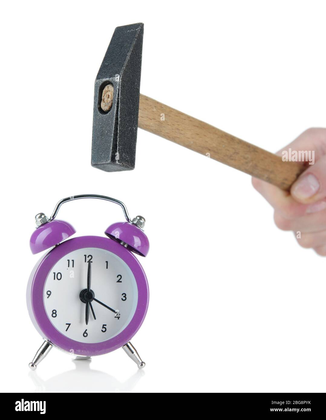 Hammer in hand and alarm clock isolated on white Stock Photo - Alamy