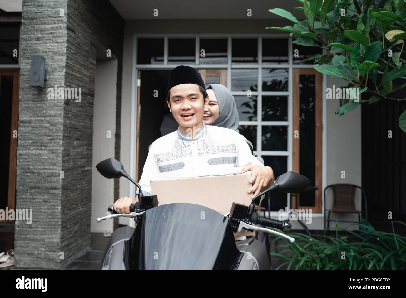 Riding motorcycle people muslim hi-res stock photography and images - Alamy