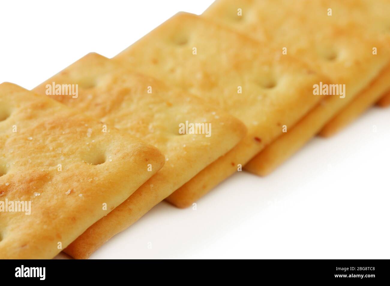 Delicious crackers isolated on white Stock Photo - Alamy
