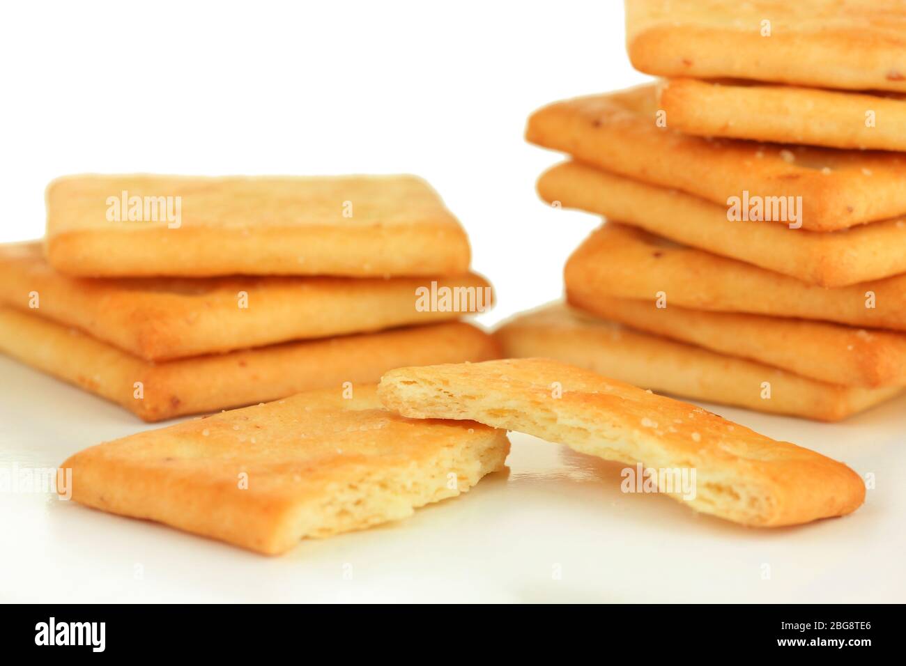 Delicious crackers isolated on white Stock Photo - Alamy