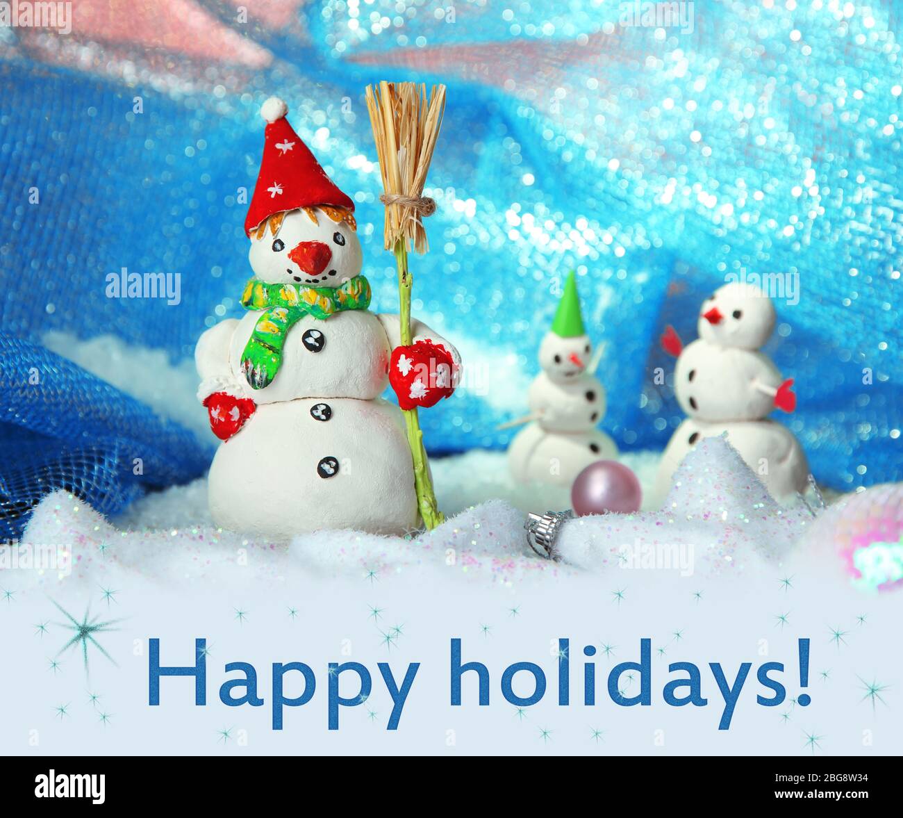 Beautiful snowmen and Christmas decor, on bright background Stock Photo ...