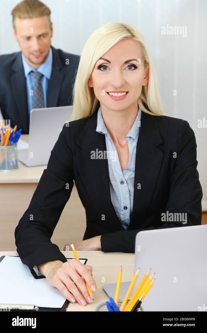 Office workers in workplace Stock Photo - Alamy