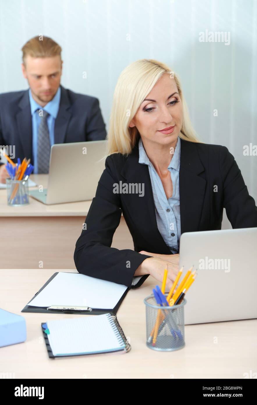 Office workers in workplace Stock Photo - Alamy