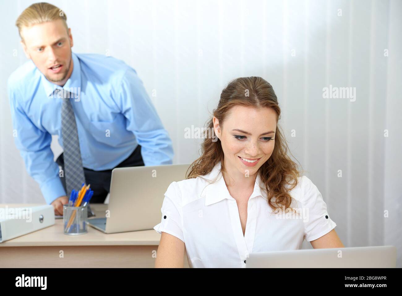 Office workers in workplace Stock Photo - Alamy