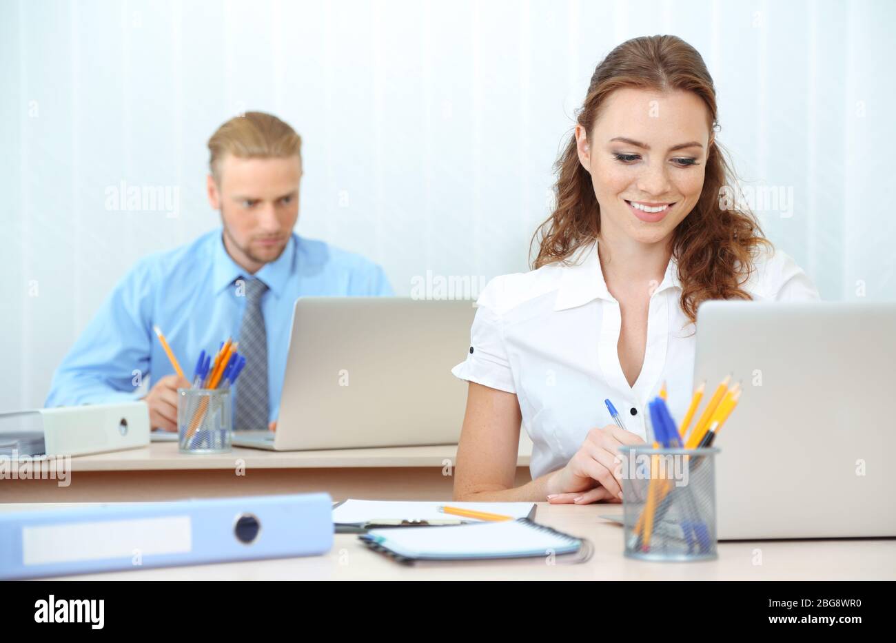 Office workers in workplace Stock Photo - Alamy