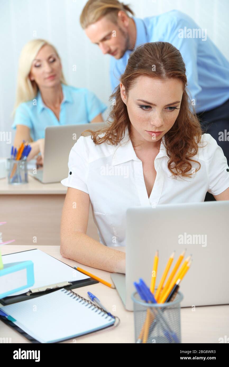 Office staff is during work in workplace Stock Photo - Alamy