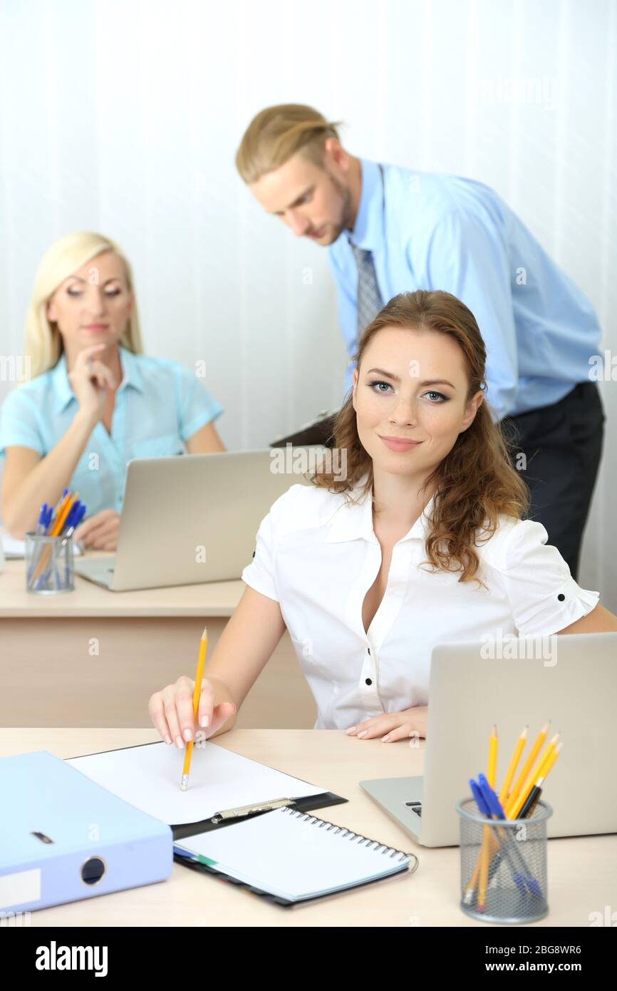 Office workers in workplace Stock Photo - Alamy