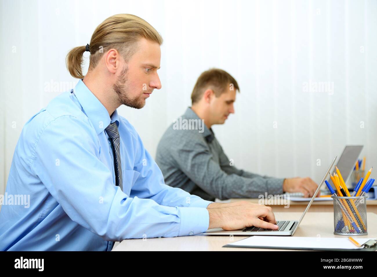 Office staff is during work in workplace Stock Photo - Alamy