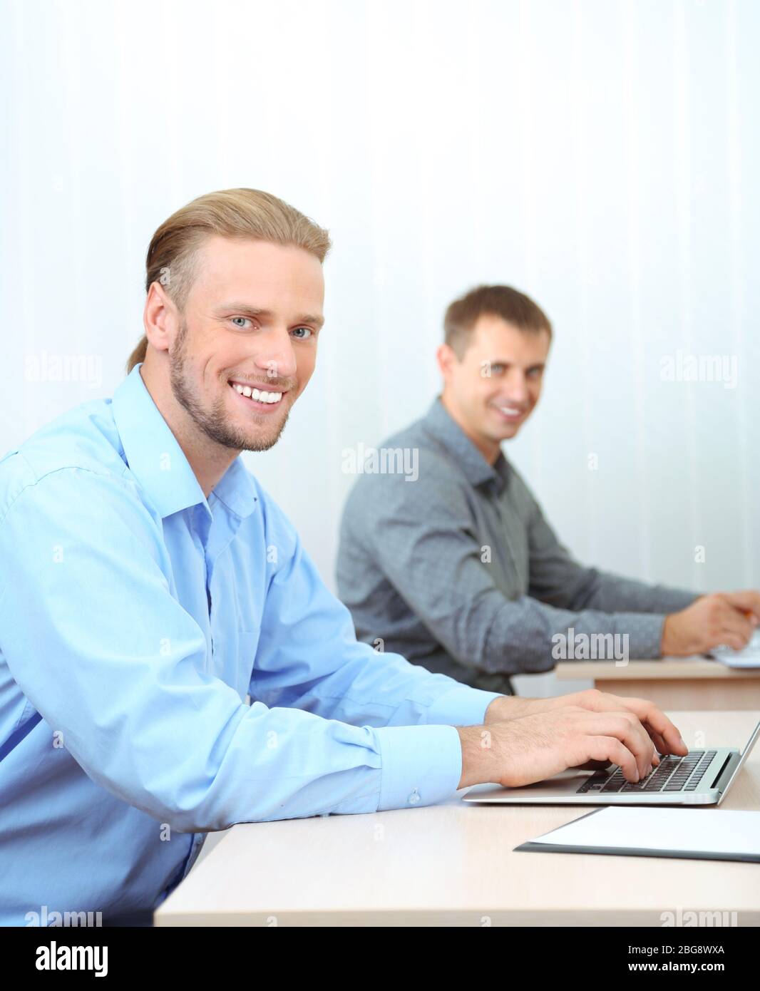 Office staff is during work in workplace Stock Photo - Alamy