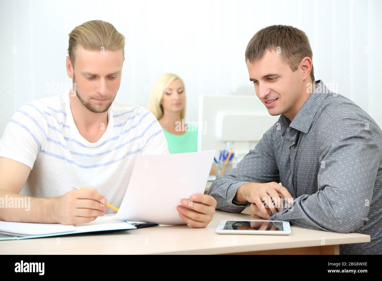 Office workers at work Stock Photo - Alamy