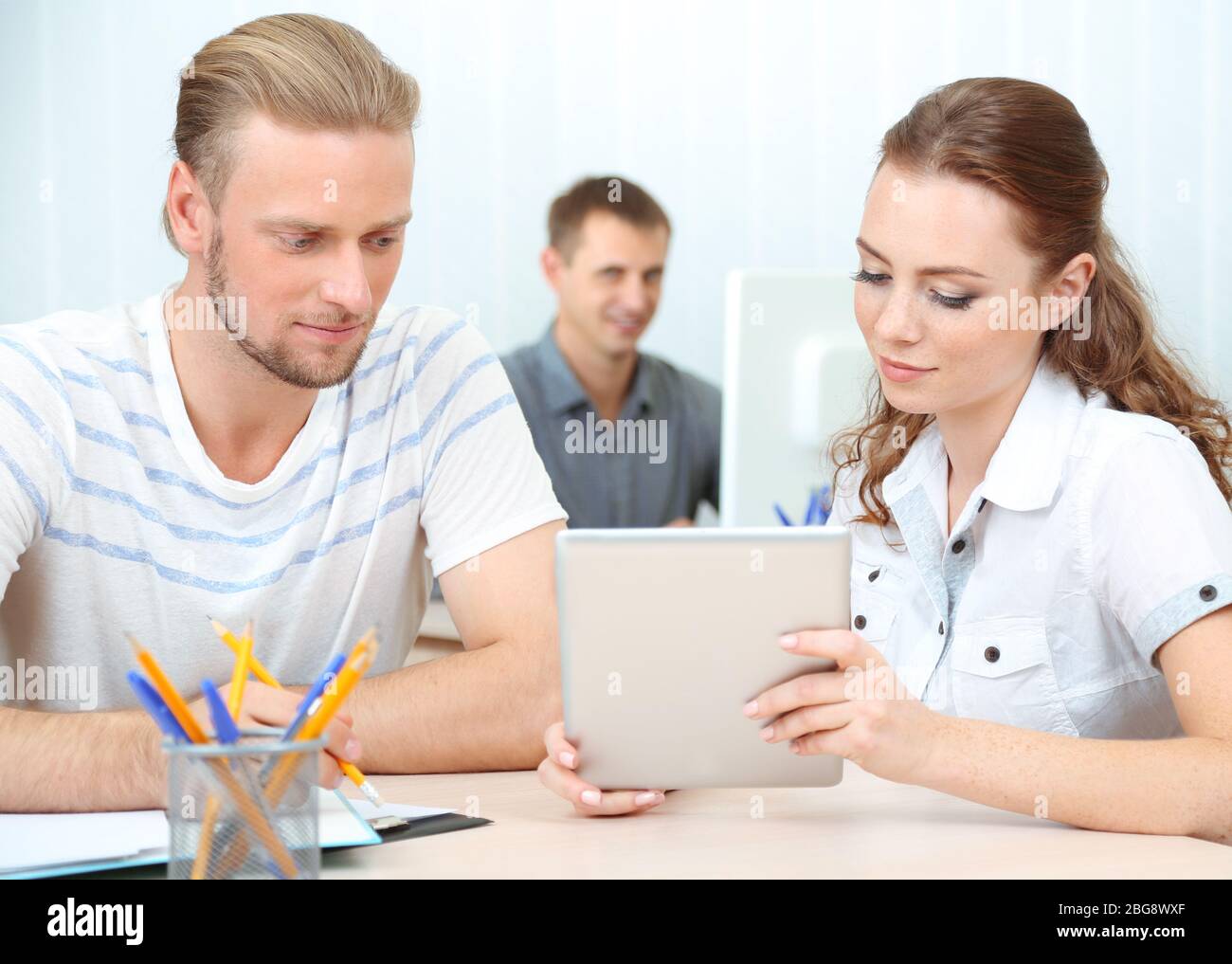 Office workers at work Stock Photo - Alamy