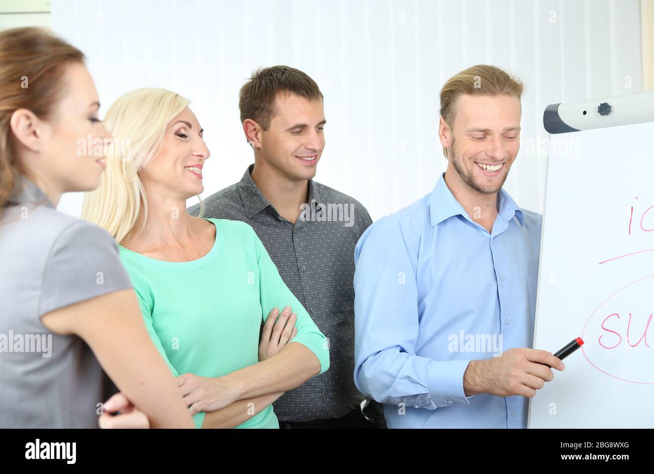 Business team working near whiteboard hi-res stock photography and ...