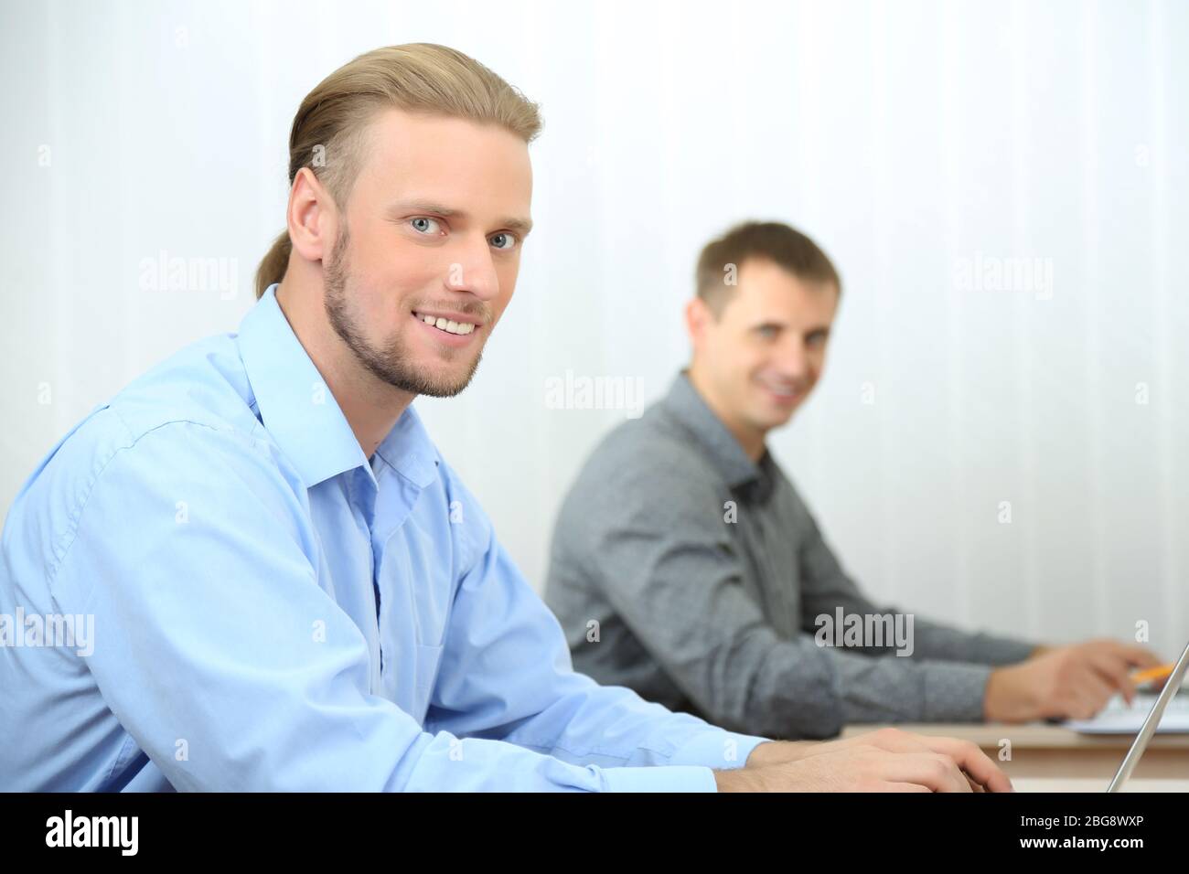 Office staff is during work in workplace Stock Photo - Alamy