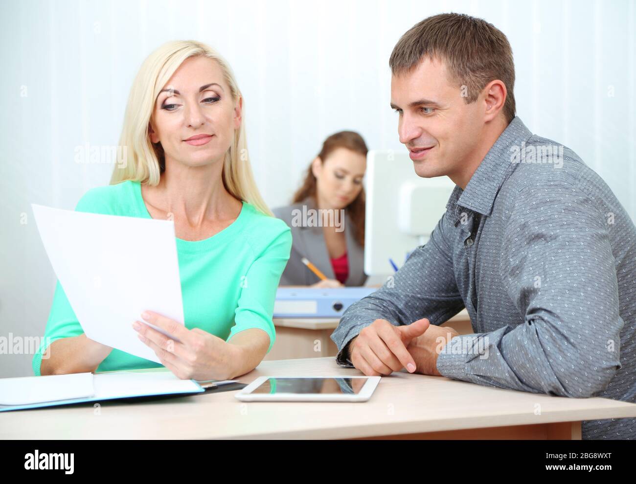 Office workers at work Stock Photo - Alamy