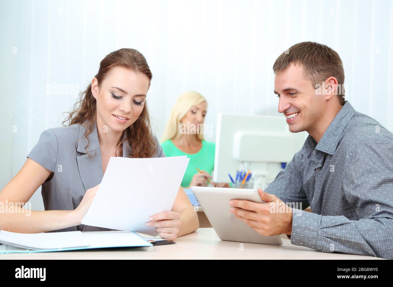 Office workers at work Stock Photo - Alamy