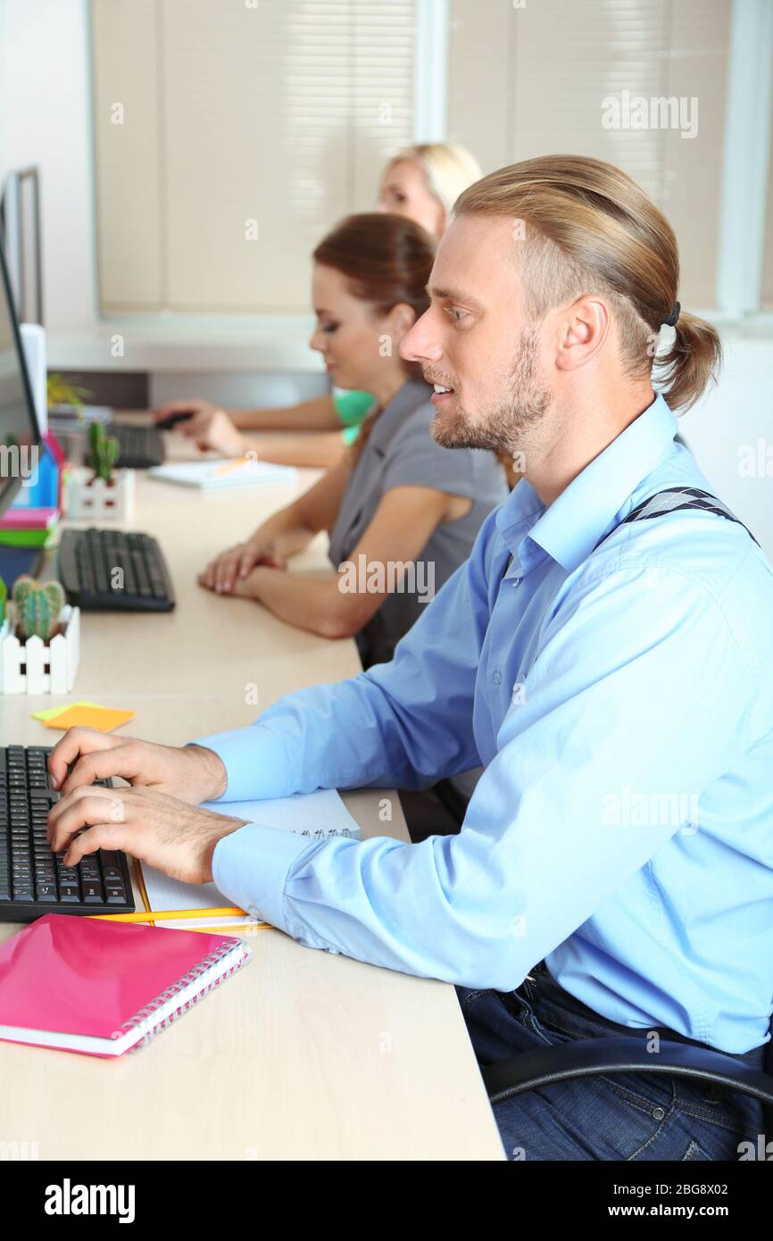 Business people at work place Stock Photo - Alamy