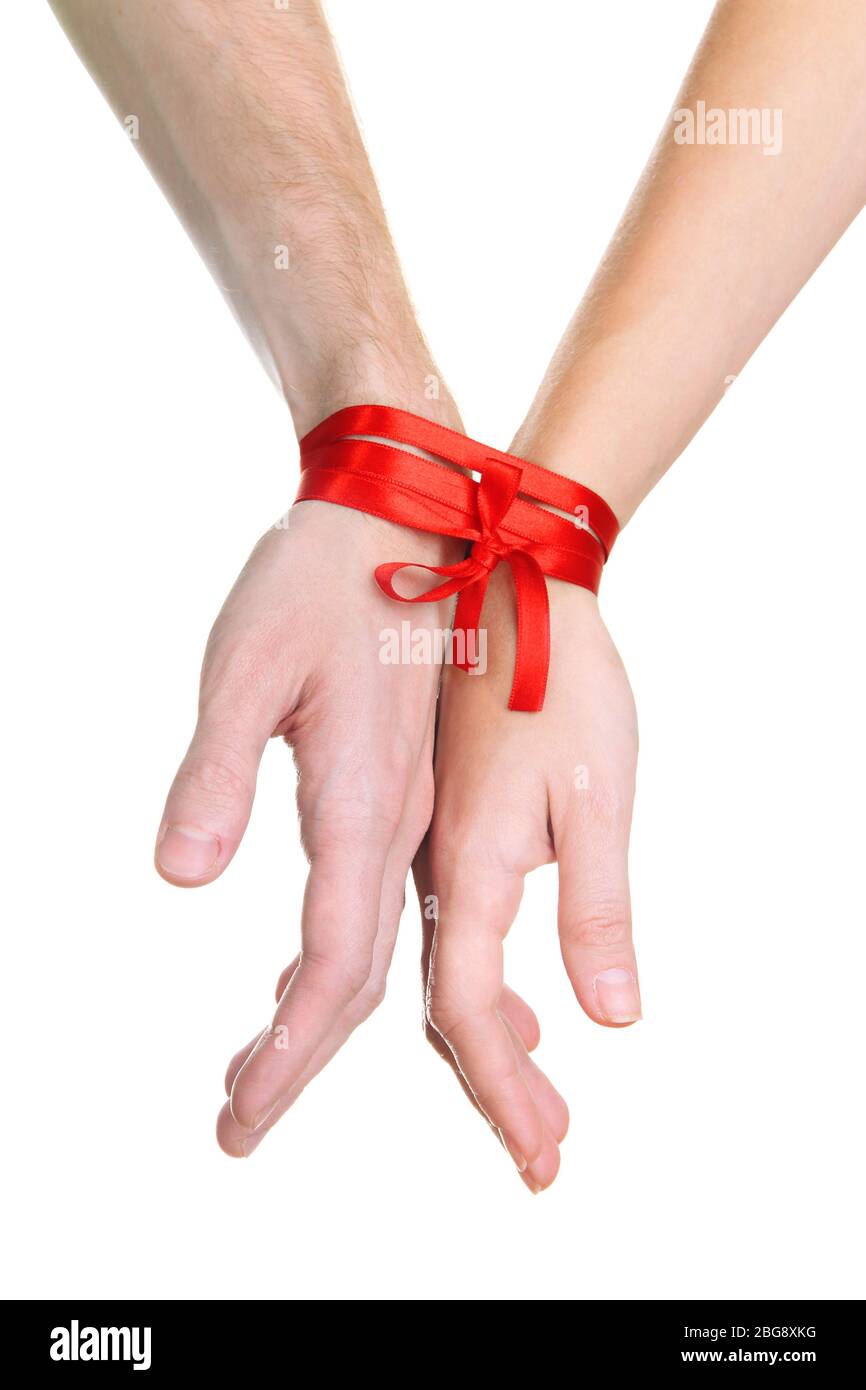 Mans and girls hands tied with ribbon isolated on white Stock Photo - Alamy