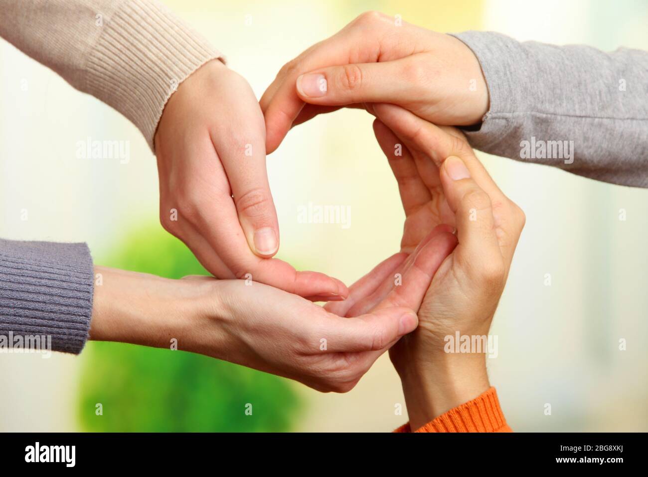 Human hands making circle on bright background Stock Photo - Alamy