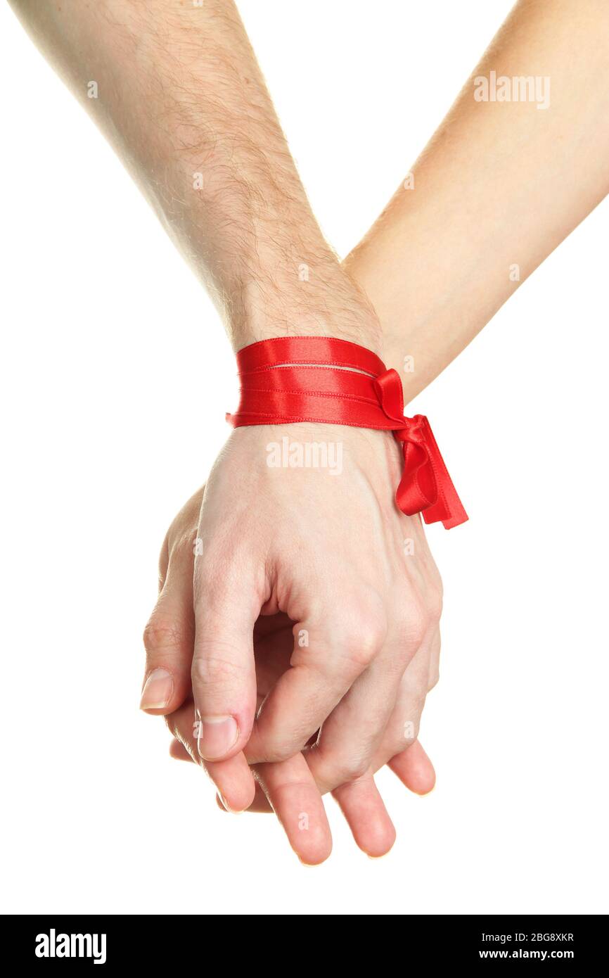 Mans and girls hands tied with ribbon isolated on white Stock Photo - Alamy
